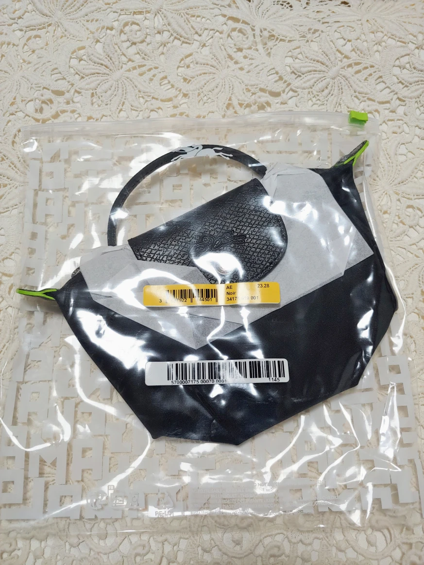 롱샴 르플리아쥬 미니 파우치 핸 당근 중고거래